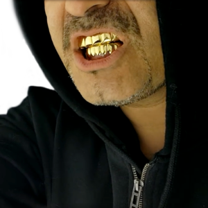 Why Do Rappers Wear Gold Teeth - Live Enhanced